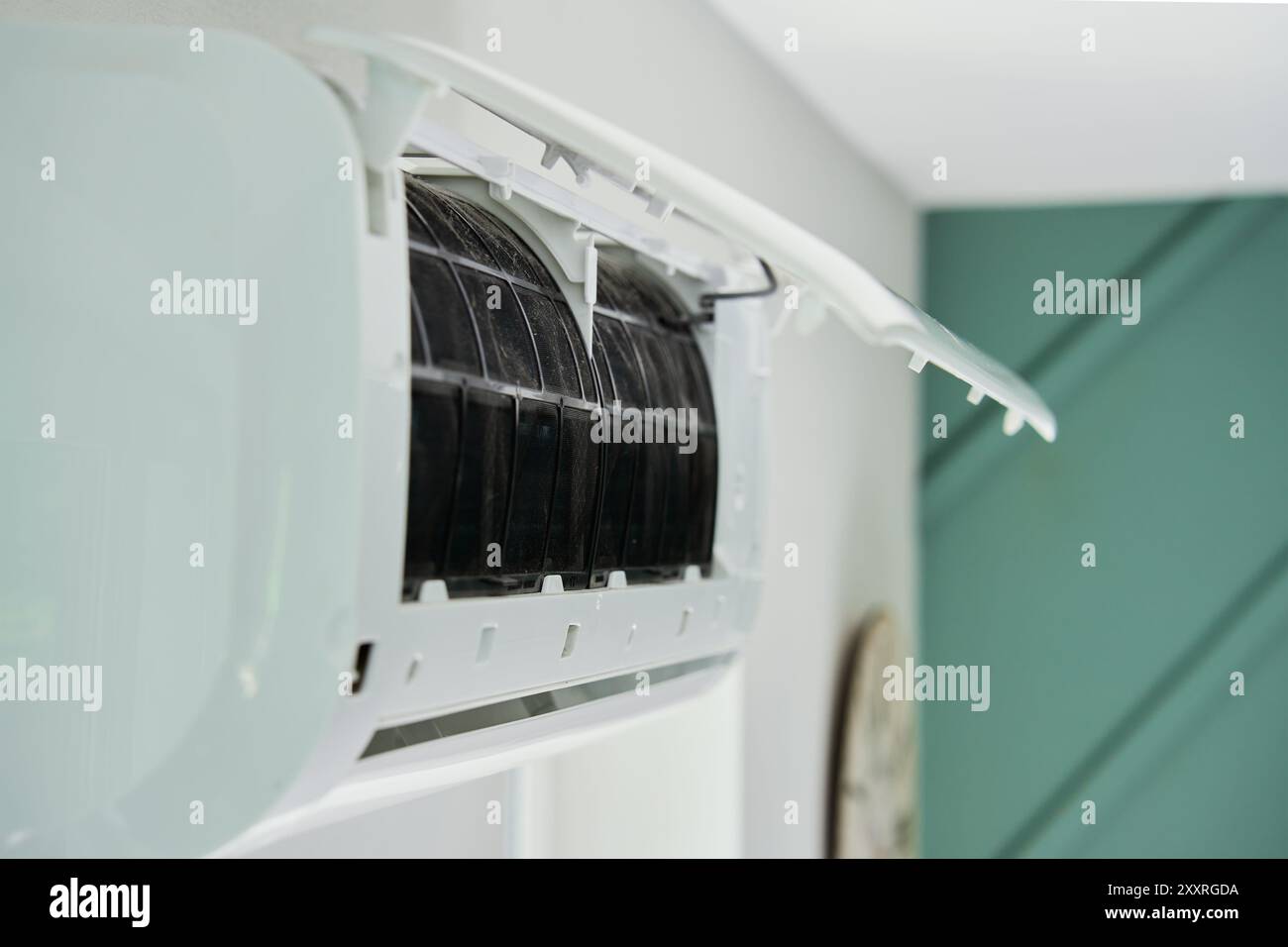 White air conditioner unit is mounted on wall, ready for maintenance ...