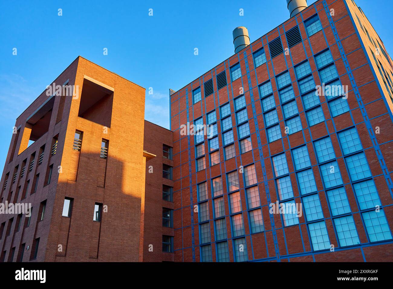 Modern brick office buildings against blue sky. Architectural detail of ...