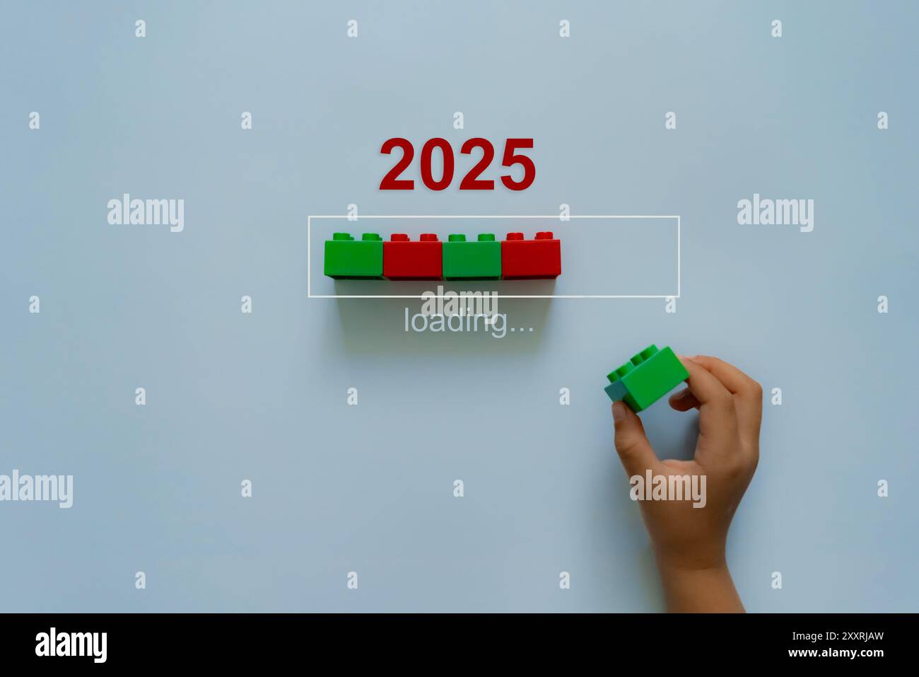 Loading new year 2024 to 2025 with child hand putting plastic block in ...