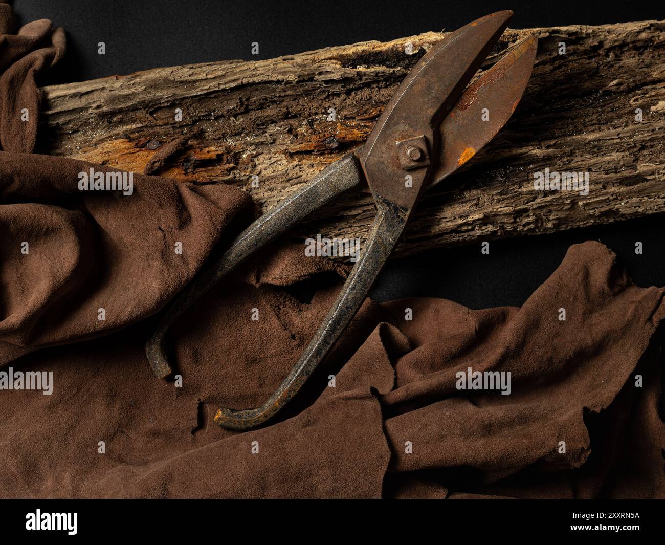 Old rusty tailors scissors on aged wood with brown fabric Stock Photo ...