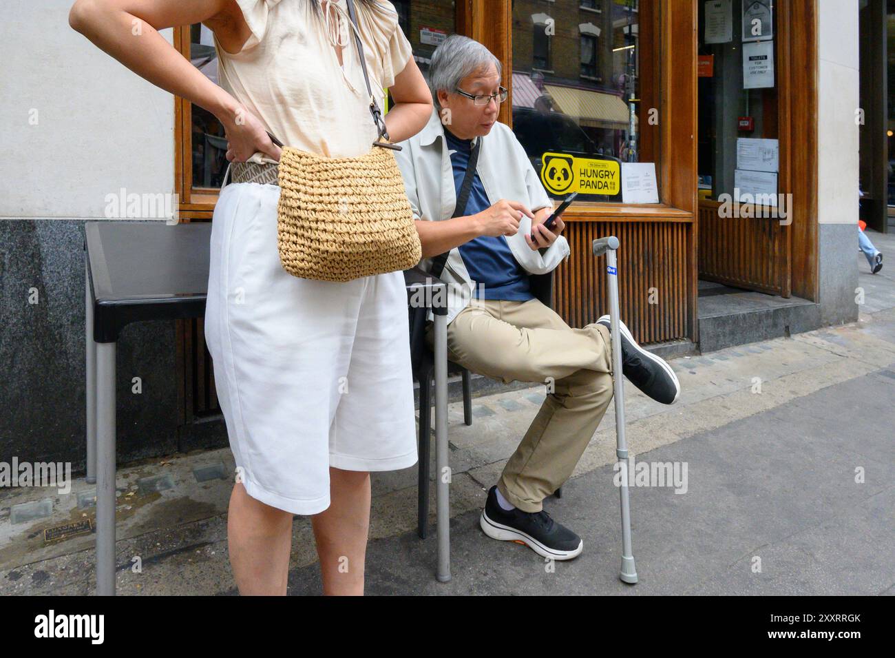 Chinese man walking stick hi-res stock photography and images - Alamy