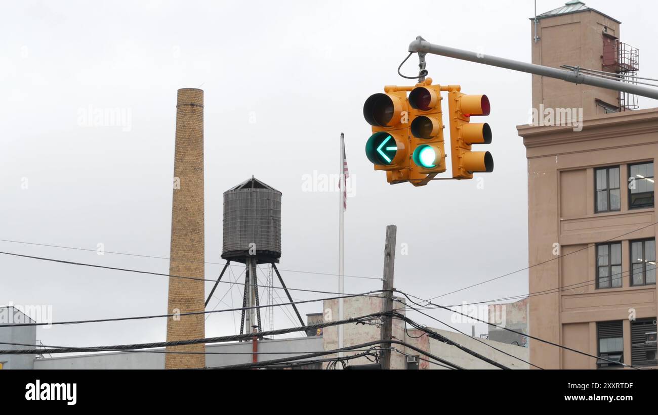 New York City street crossroad, yellow traffic light, transport road ...