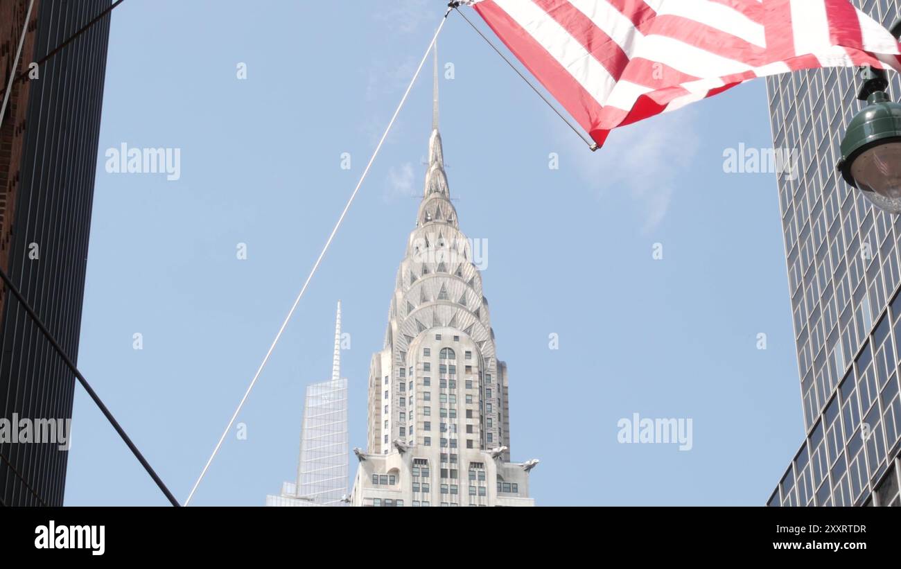 New York, american flag waving. Chrysler building. Manhattan midtown 42 ...