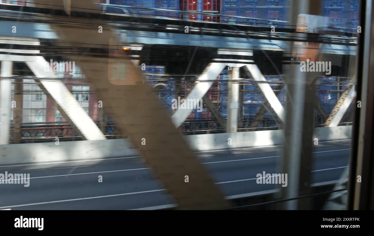 New York City subway train, Manhattan bridge. Shaking camera thru dirty ...
