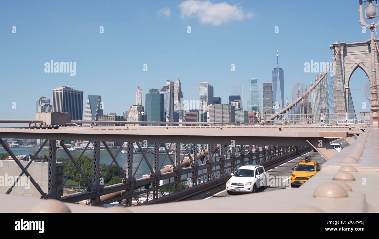 Cars on Brooklyn Bridge. New York City Manhattan downtown skyline ...