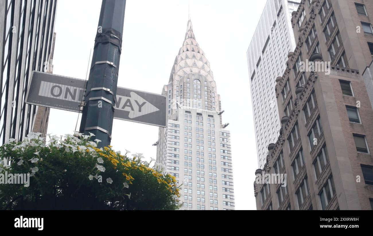 New York City crossroad, street intersection road sign post. Chrysler ...