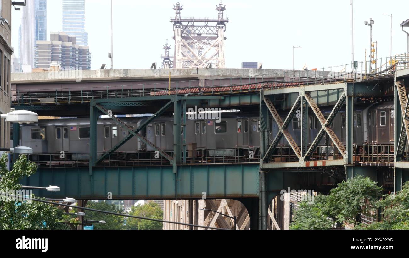 New York elevated subway, metropolitan bridge, metro track above street ...