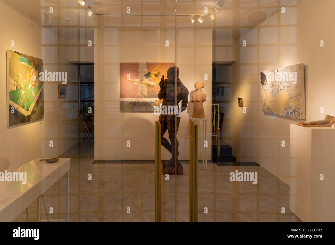 Interior of a modern art gallery showcasing sculptures and abstract ...