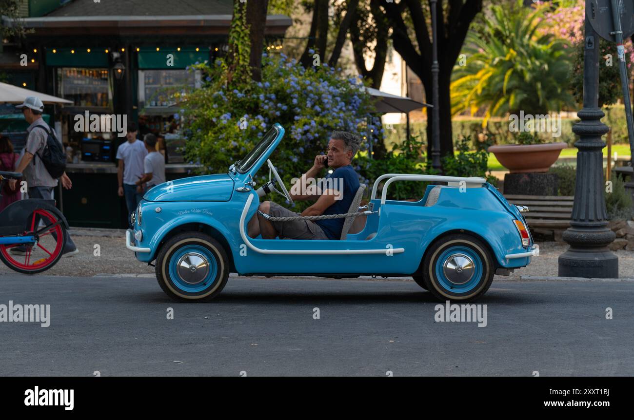 Man driving convertible enjoys road hi-res stock photography and images ...