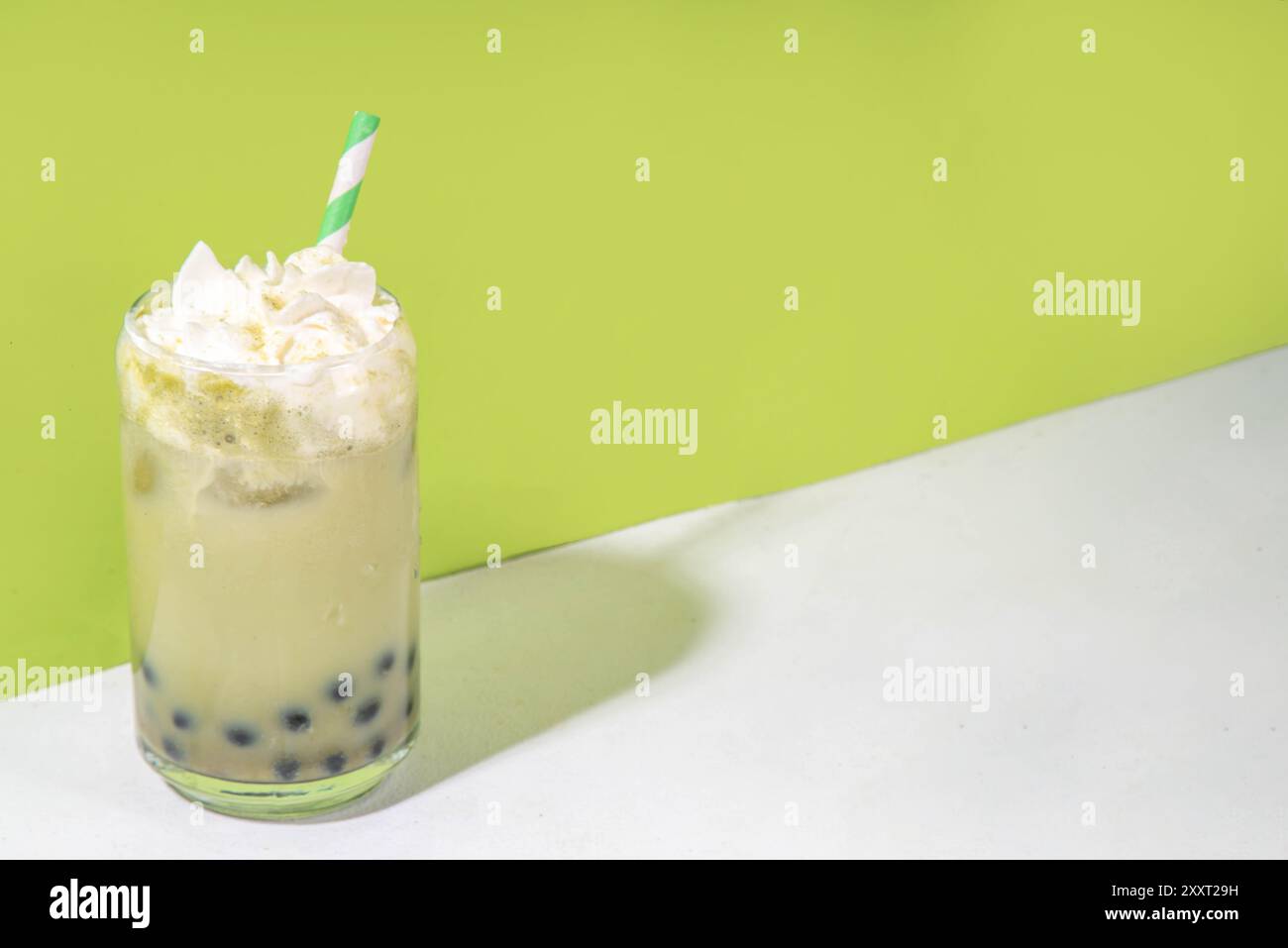 Green matcha boba bubble tea with tapioca pearl. Trendy asian cold iced ...