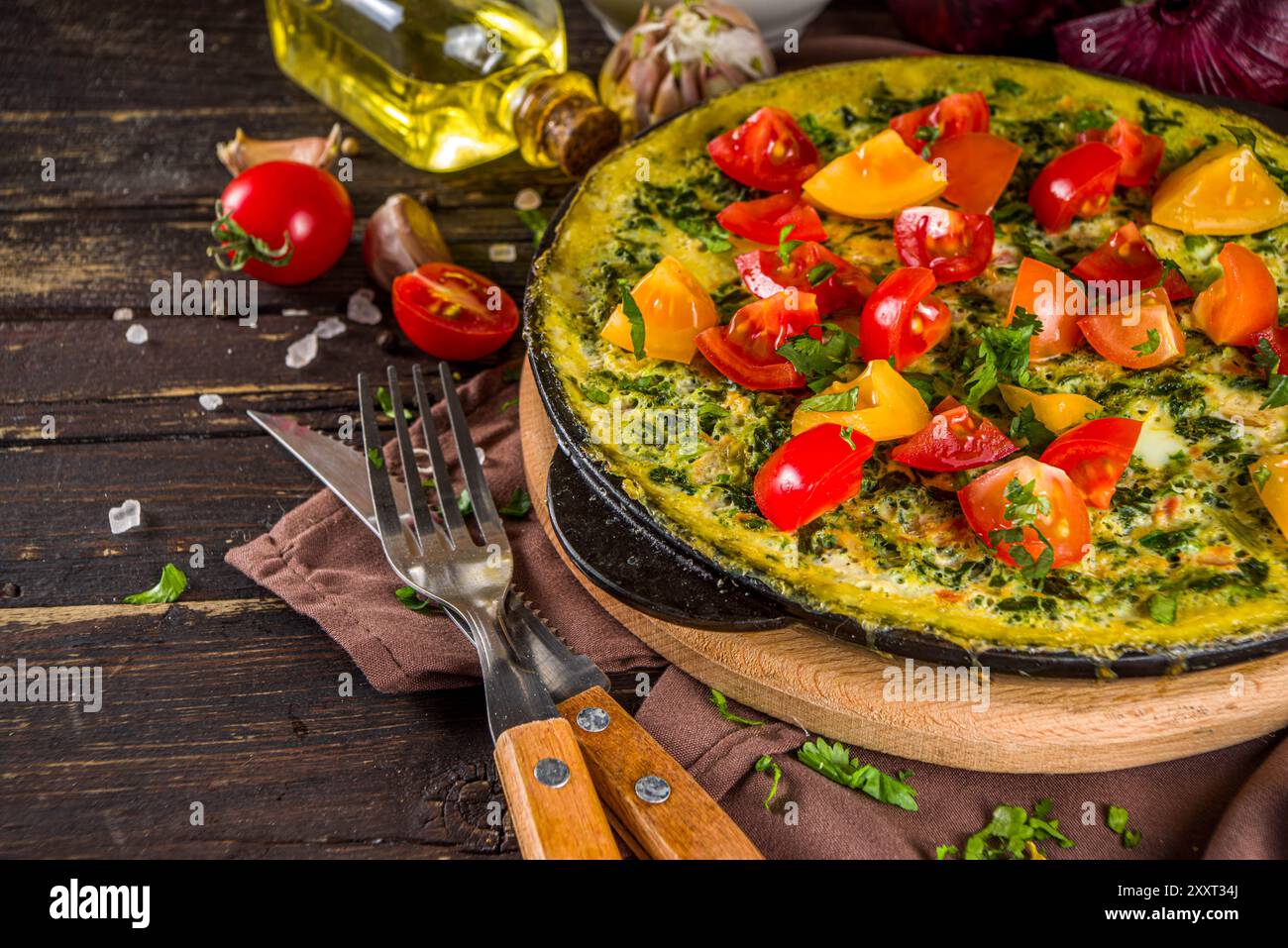 Homemade rustic style frittata. Frittata with spinach, cheese and ...