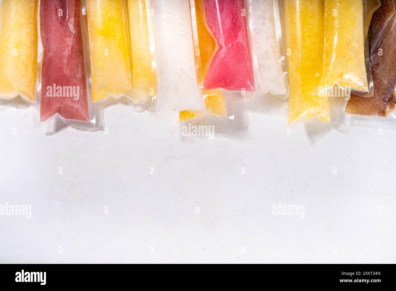 Frozen juice sticks in plastic ice packaging bag, Colorful ice cream on ...