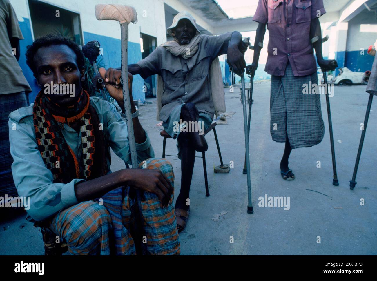 Amputees who lost limbs in the fighting wait for food in Mogadishu ...
