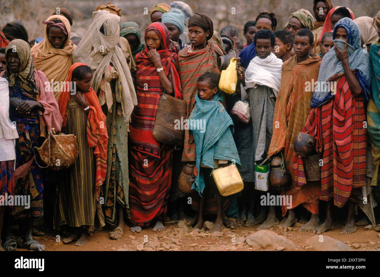 Malnourished people wait for food distribution in Baidoa, Somalia Stock ...