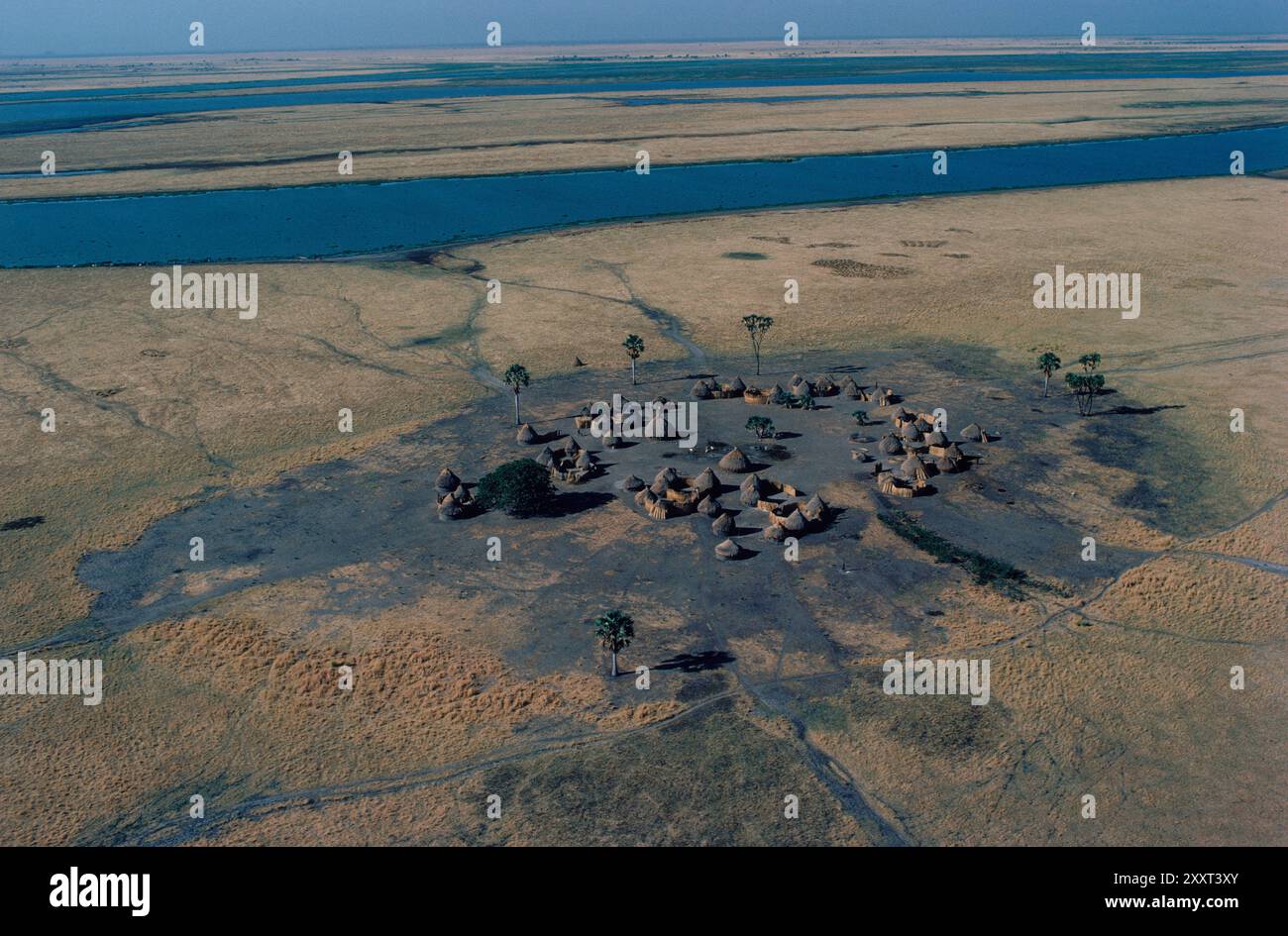 Aerial of a Nuer village near the Nile in southern Sudan Stock Photo ...