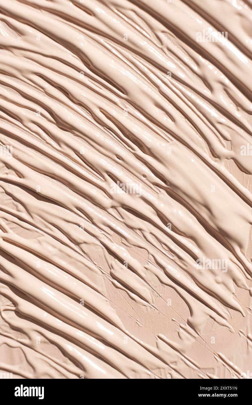 Face foundation texture, beautiful unusual beige abstract background ...