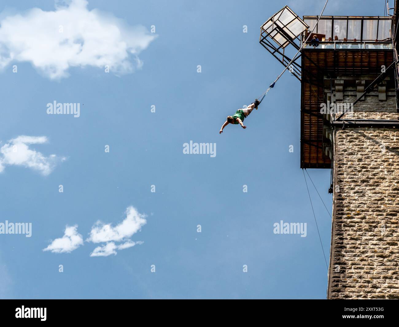 Clecy, Normandy, France, May 10, 2024. Jumping on a bungee cord in ...