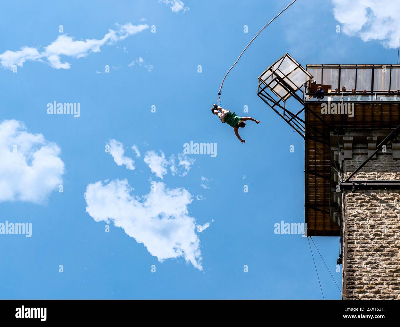 Clecy, Normandy, France, May 10, 2024. Jumping on a bungee cord in ...