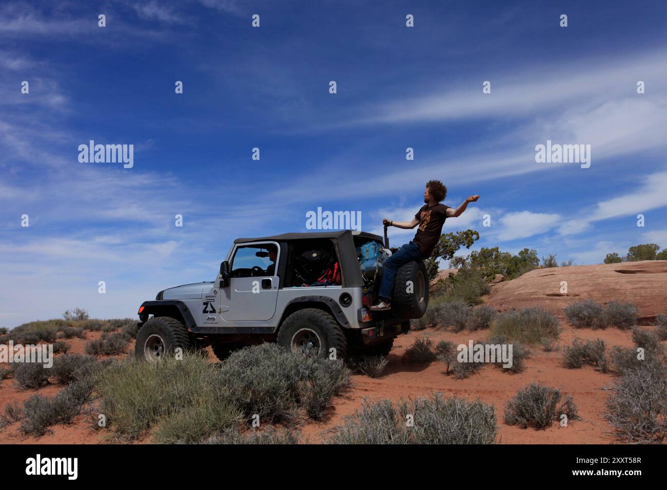 Andy Lewis on his way to highline at the Fruit Bowl, Moab Utah Stock ...