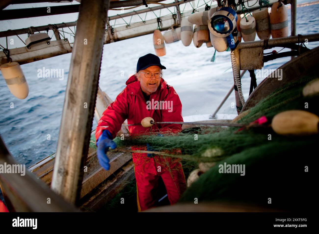 The founder of Loki Fish, Inc., lays out his net aboard the salmon ...