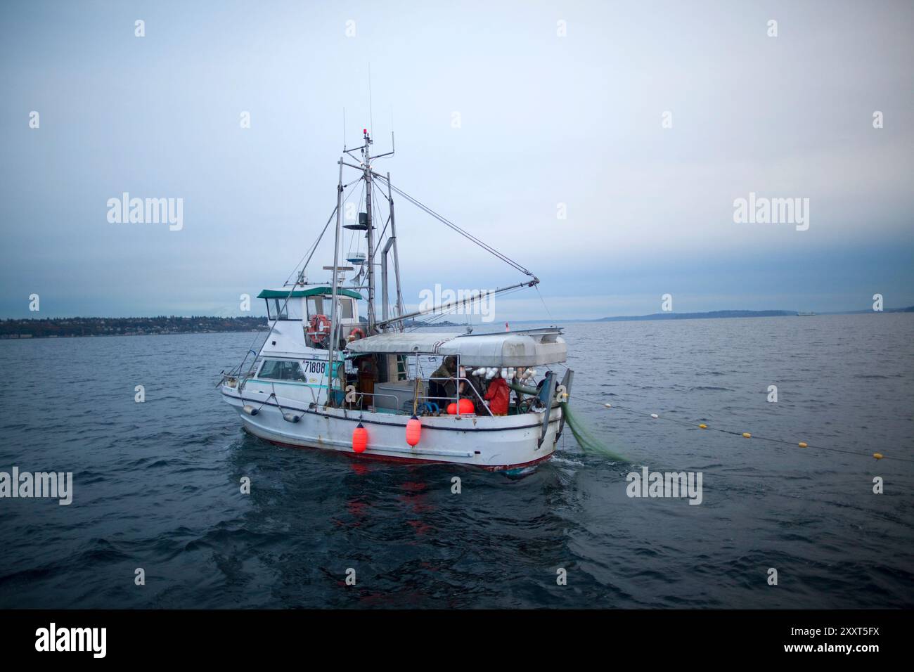 The founder of Loki Fish, Inc., lays out his net aboard the salmon ...