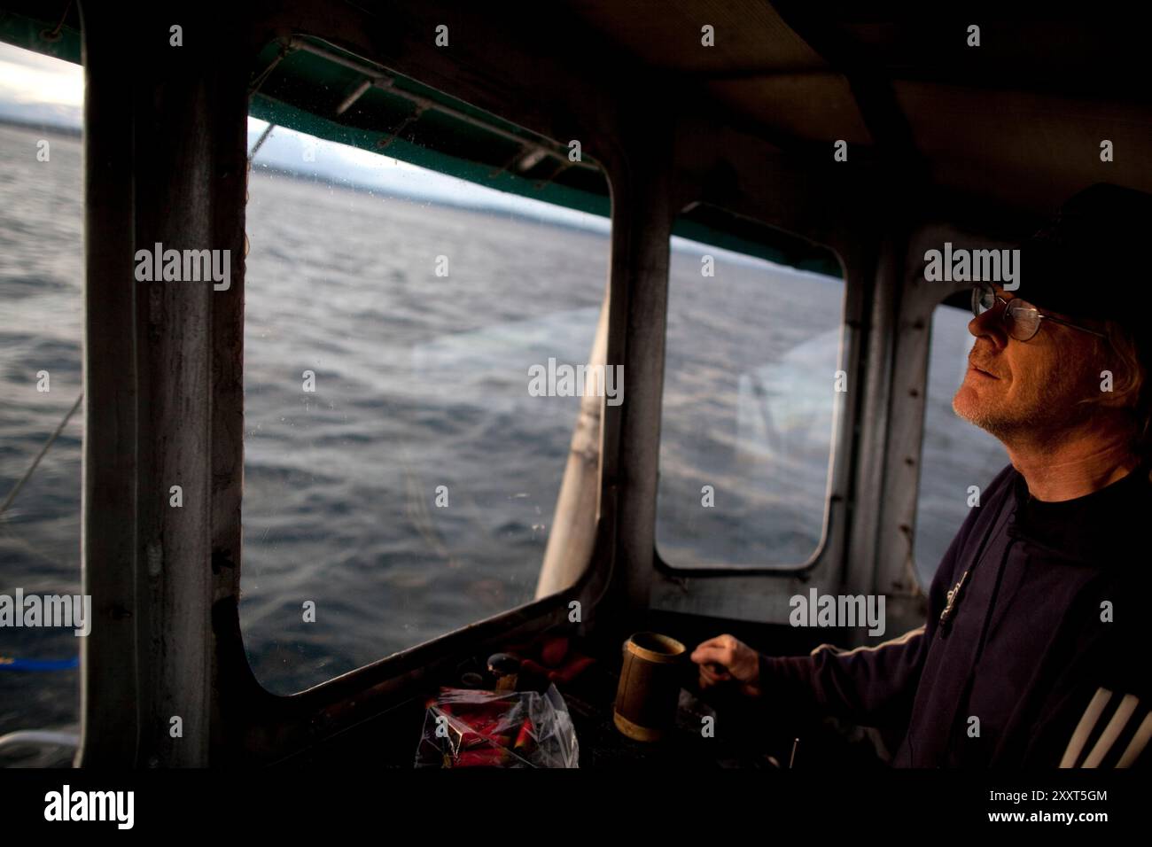 The founder of Loki Fish, Inc., lays out his net aboard the salmon ...
