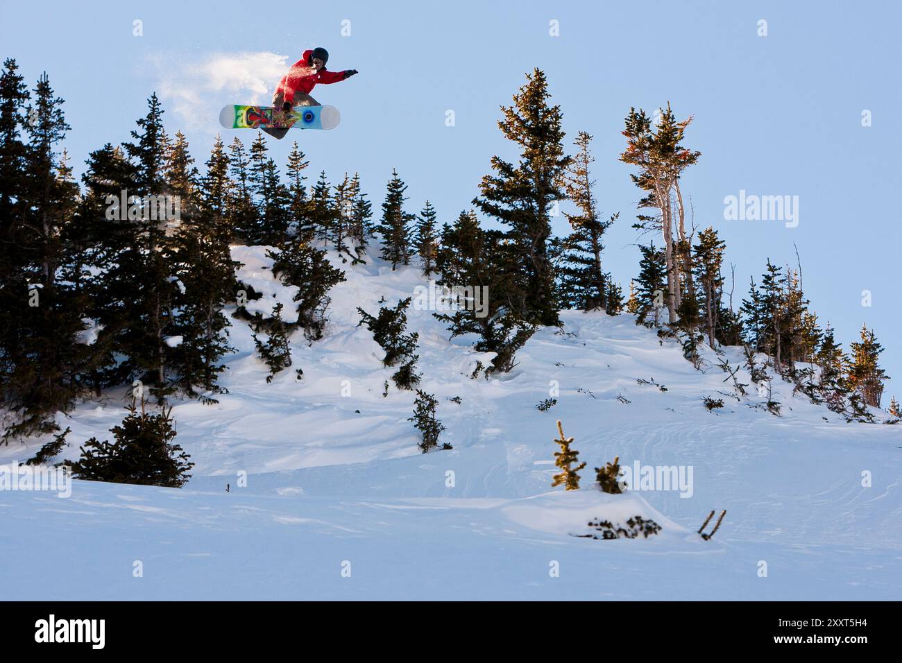 Snowboarder Performing a Method Stock Photo - Alamy