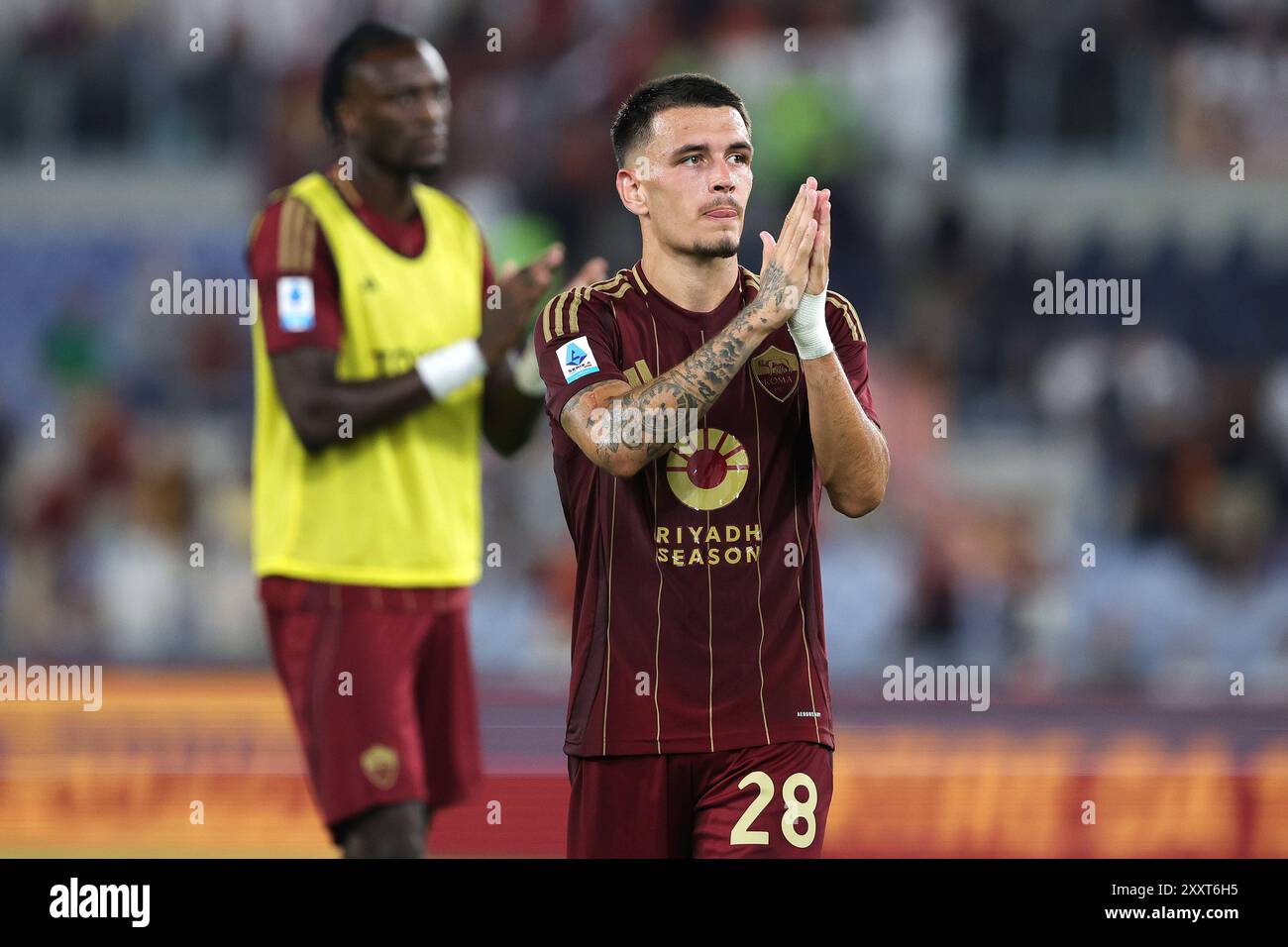 Rome, Italy. 25th Aug, 2024. Enzo Le Fee of Roma greets his fans at the ...