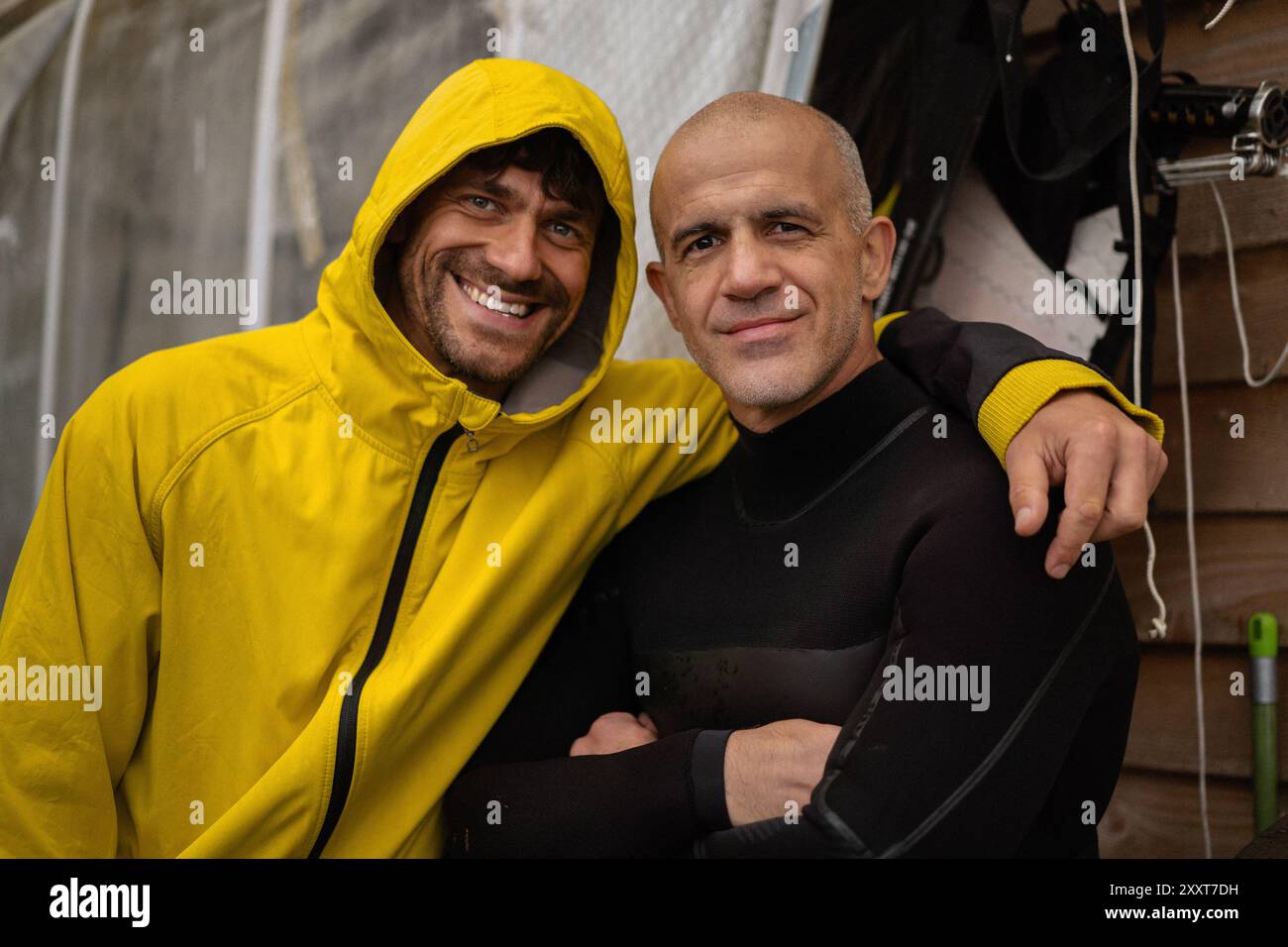Two happy men friends on an outdoor Stock Photo - Alamy