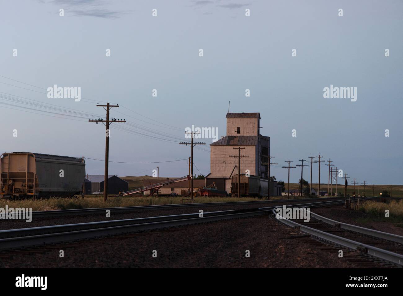 Rural country scene with railroad tracks and barn silo Stock Photo - Alamy