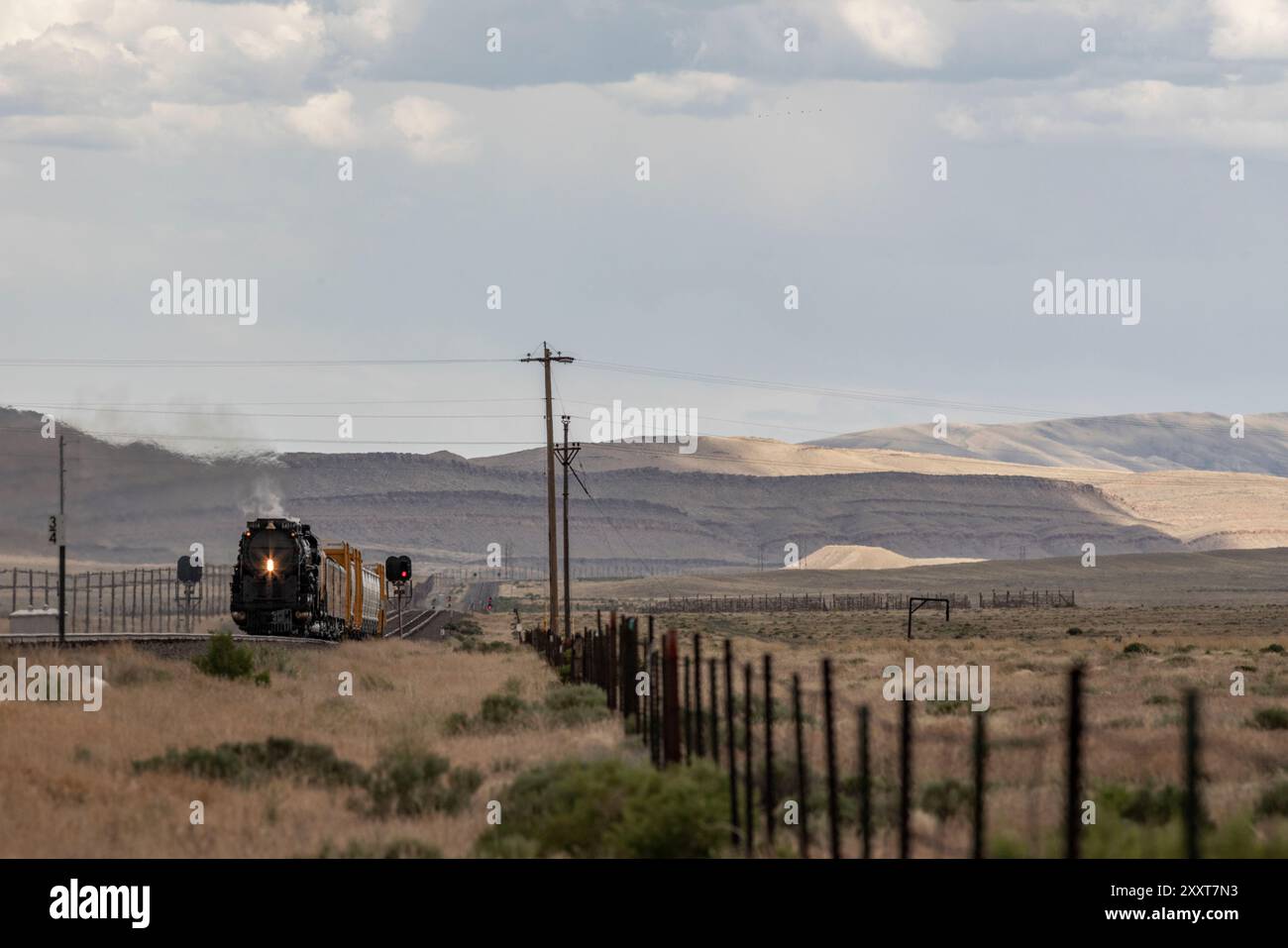 A steam engine in the distance going through a prairie Stock Photo - Alamy