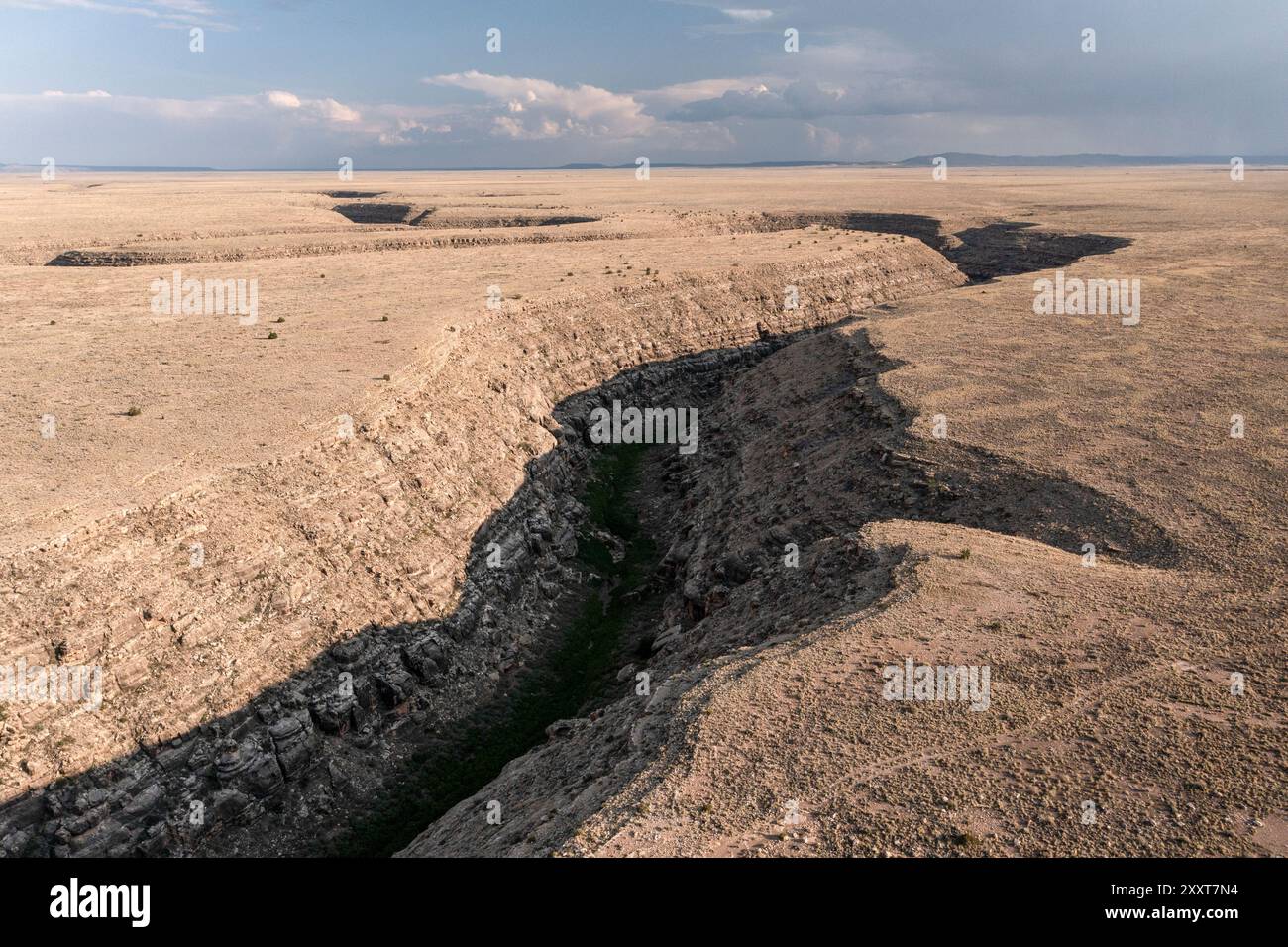 A deep canyon in a barren desert environment Stock Photo - Alamy