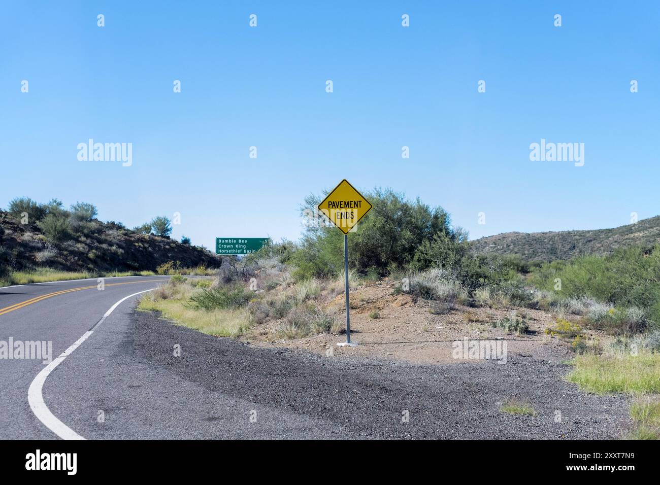 Pavement ends road sign in rural area Stock Photo - Alamy