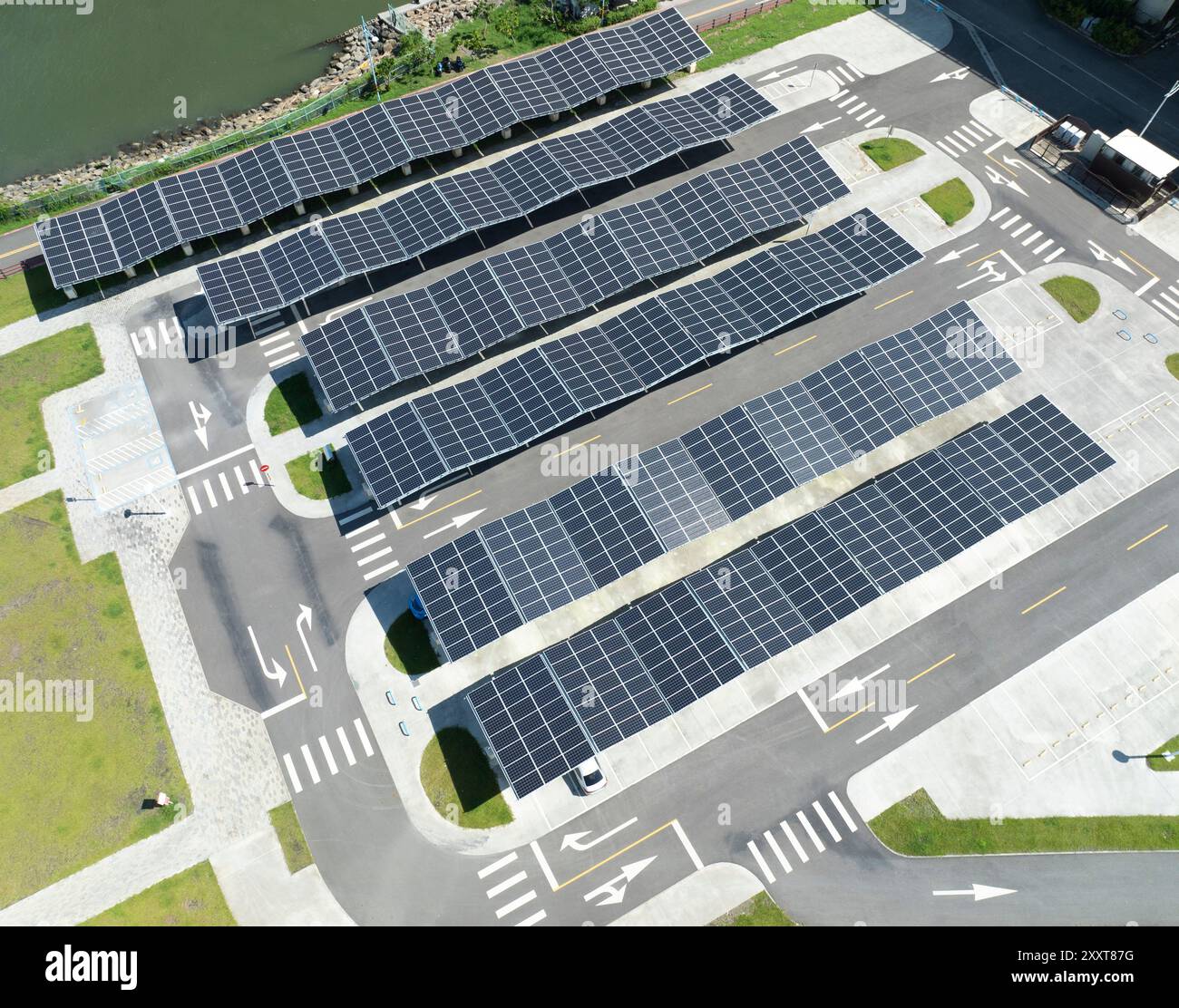 Aerial view above innovative solar panels located on a car parking lot ...