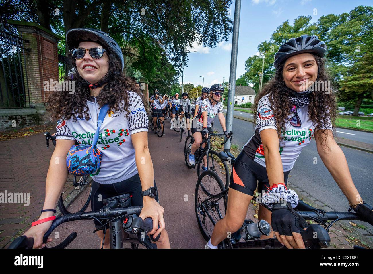 Journeys end, as the 100 cyclists reach the International Court of ...
