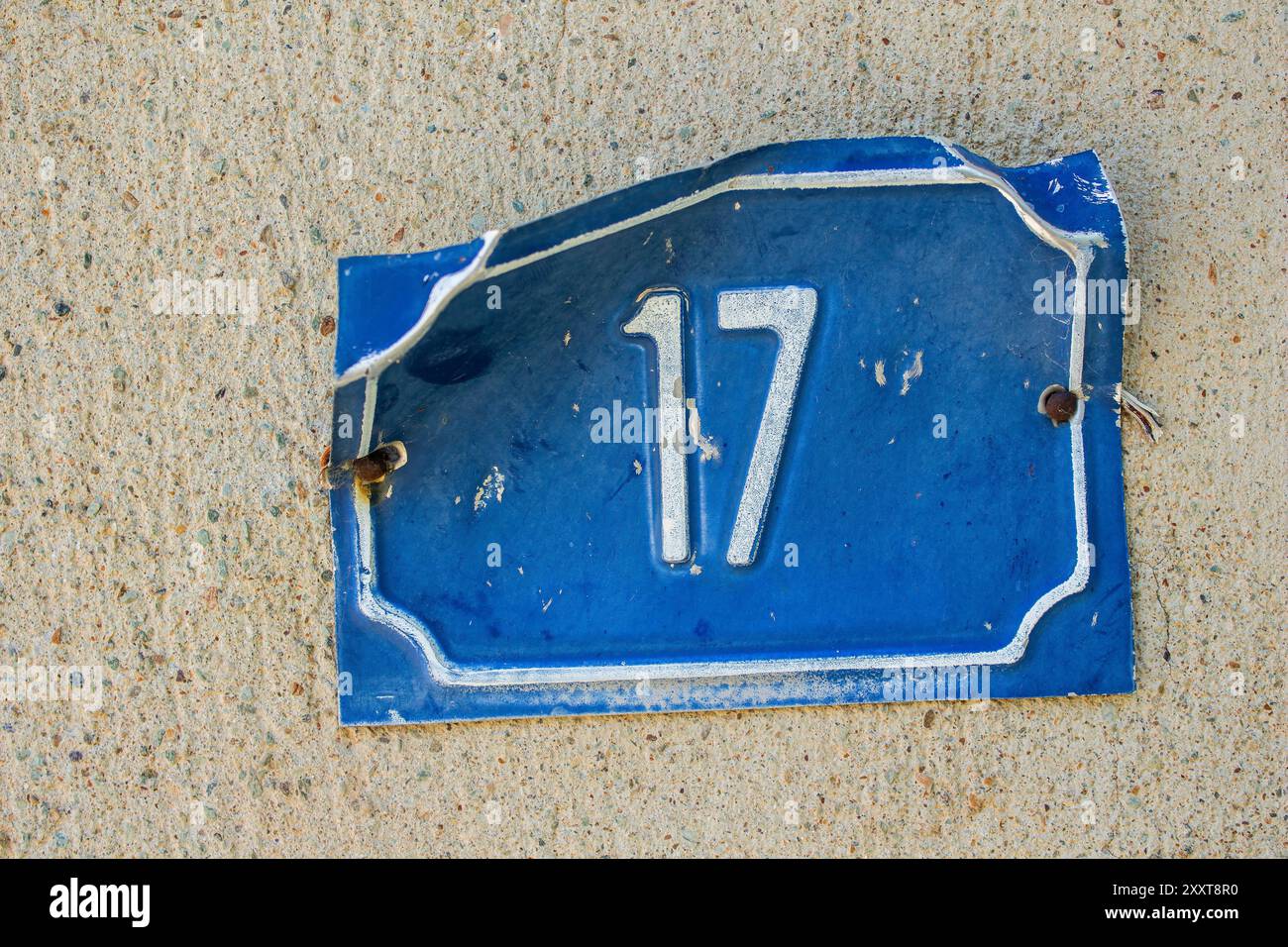 Old metal building number plaque on wall with number 17 Stock Photo - Alamy