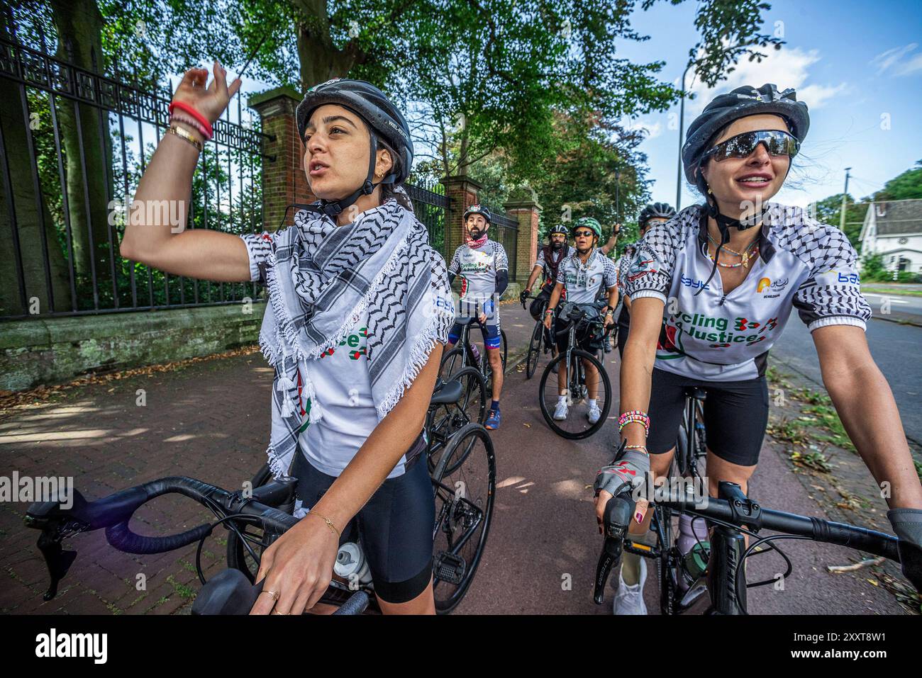 Journeys end, as the 100 cyclists reach the International Court of ...