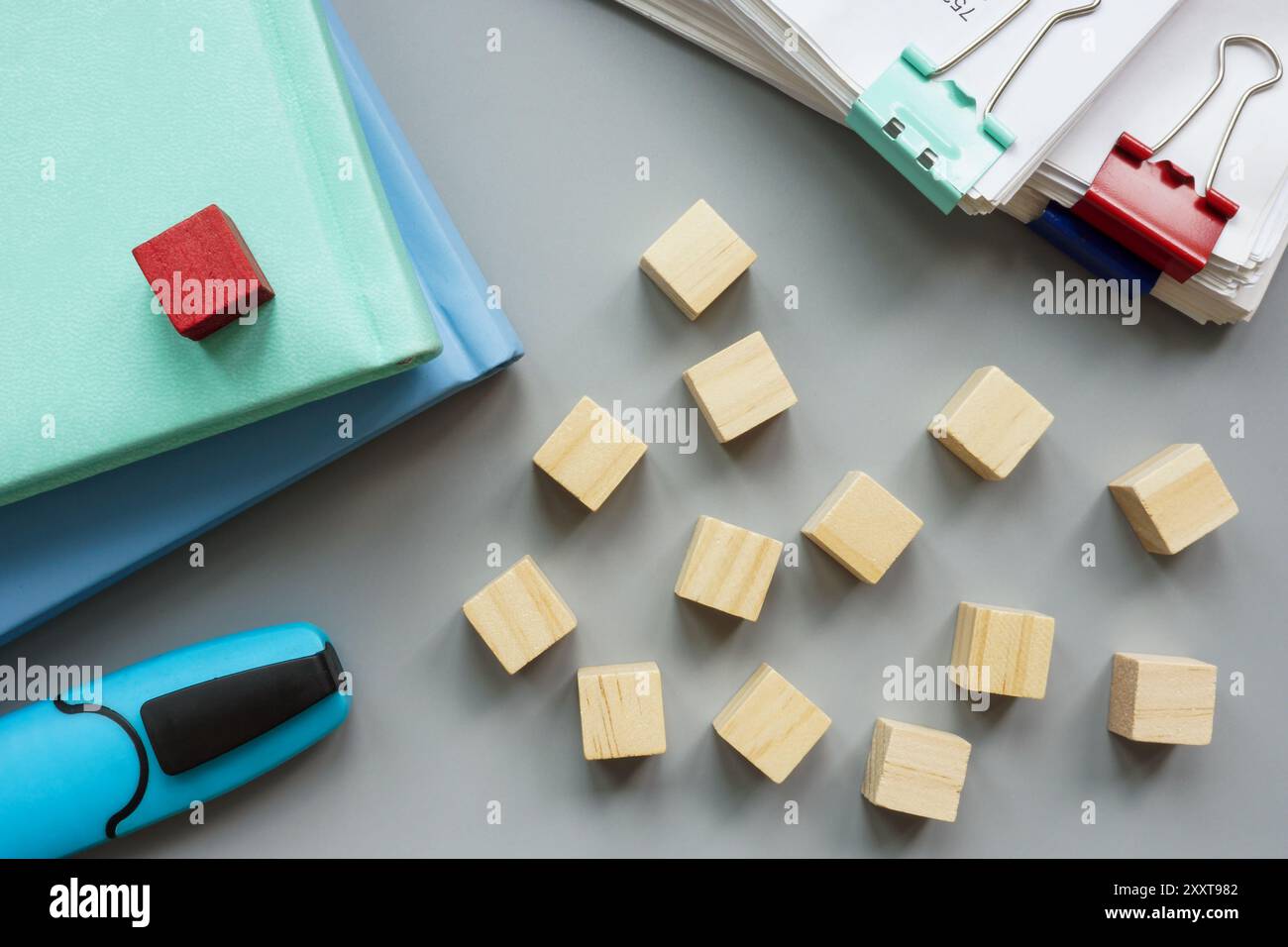 Cubes on an office desk symbolizing a team and a leader. Leadership ...