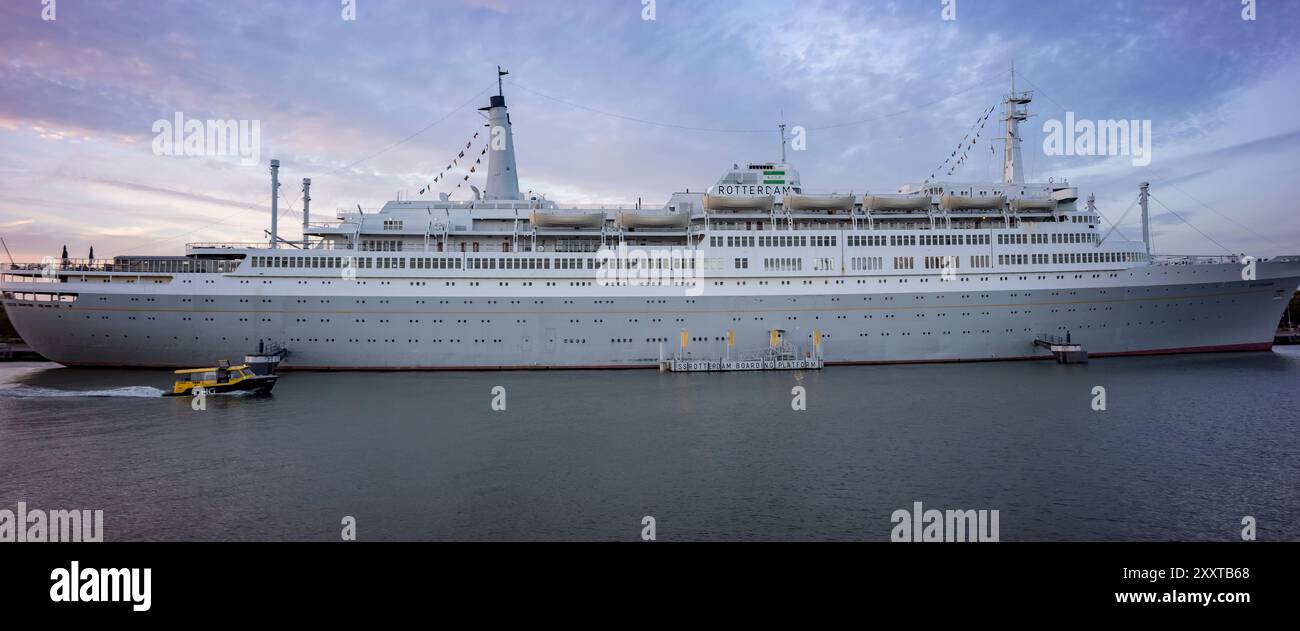 Cruise ship SS Rotterdam in front of the iconic Dutch port city skyline ...
