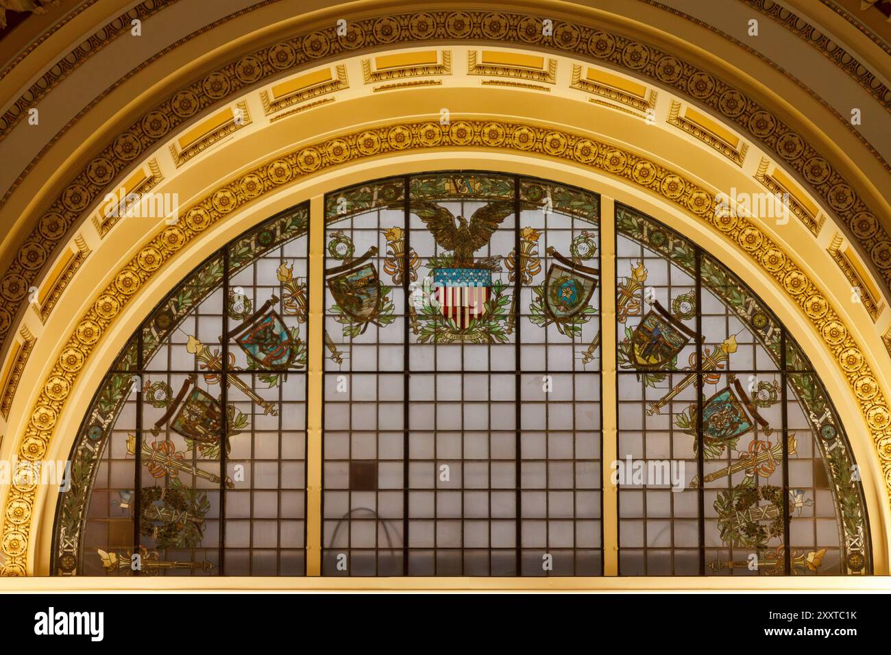 The semi circular stained glass window inside of the elegant Thomas ...