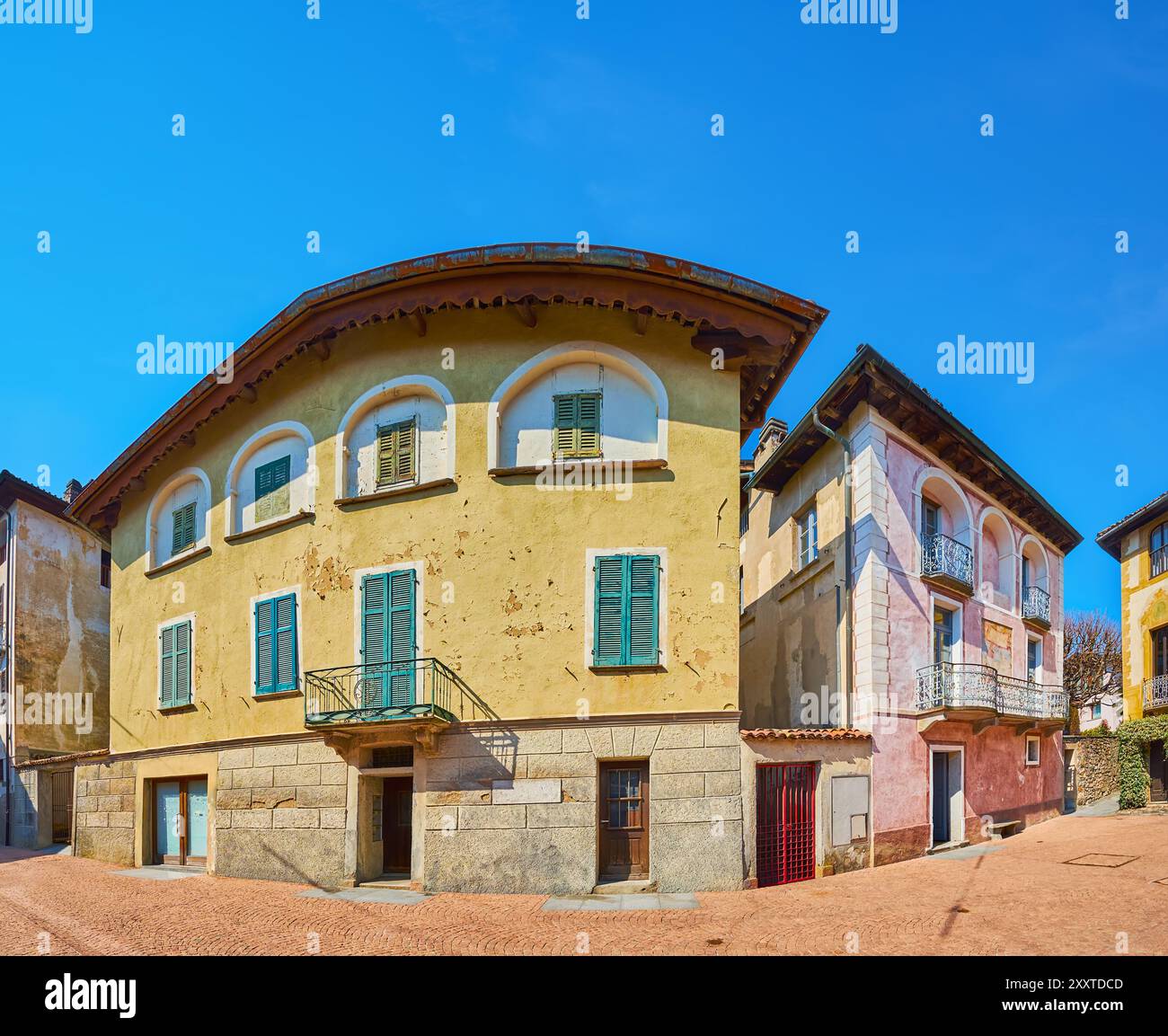 The splendid medieval townhouses on the Piazza Montaa, one of the ...