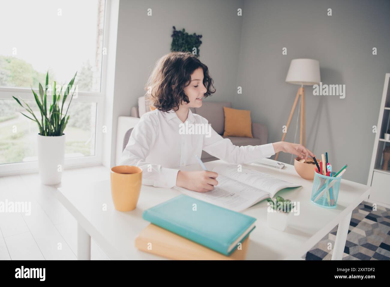 Photo of cute adorable little boy schoolkid wearing white shirt ...