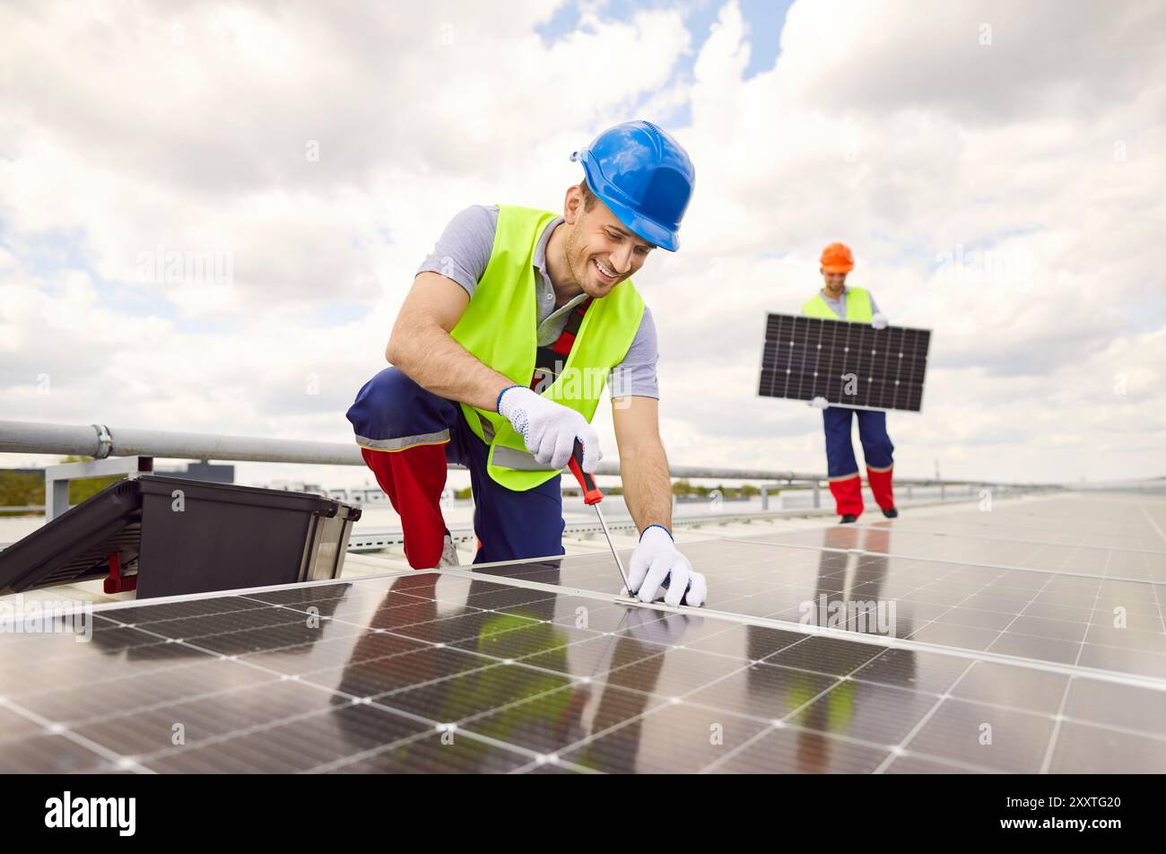 Workers installing solar panel system hi-res stock photography and ...