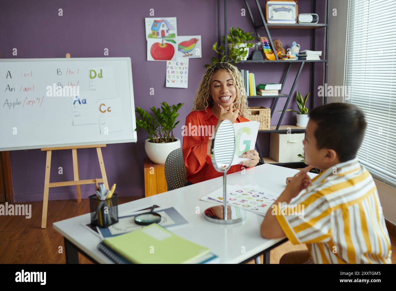 Engaging in Language Learning Session with Young Student Stock Photo ...