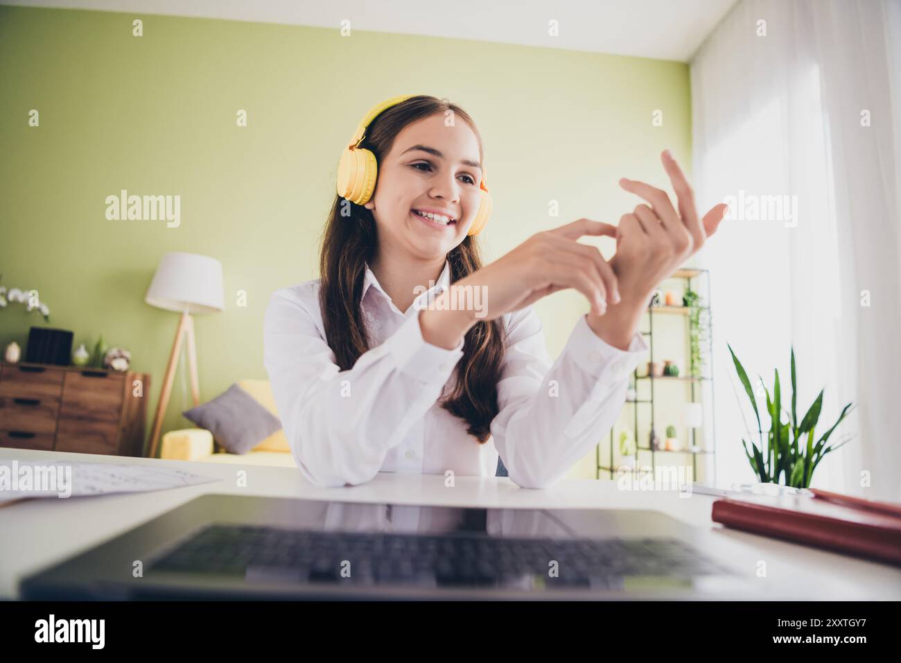 Photo portrait of cute adorable teen girl computer elearning webcam talk headphones wear uniform ...