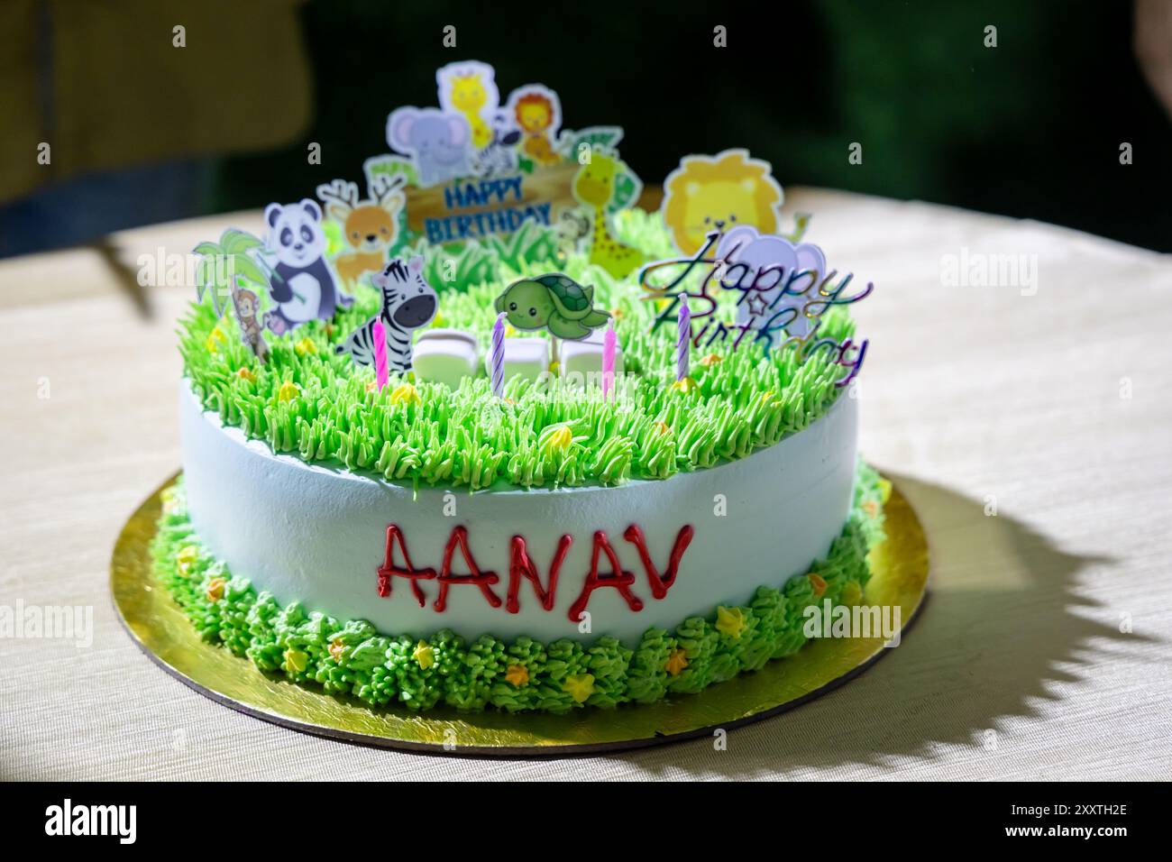 Gorgeous forest theme Cake with animal cut outs from different angle ...