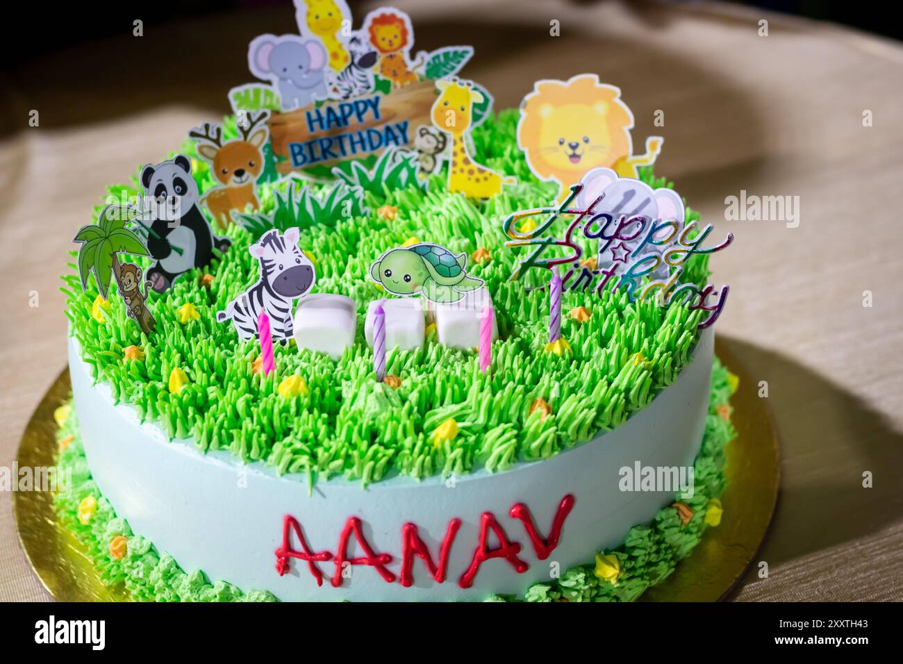 Gorgeous forest theme Cake with animal cut outs from different angle ...