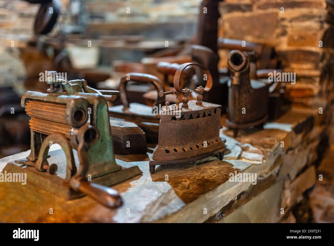 Very old irons used to iron clothes in the villages of Spain Stock ...