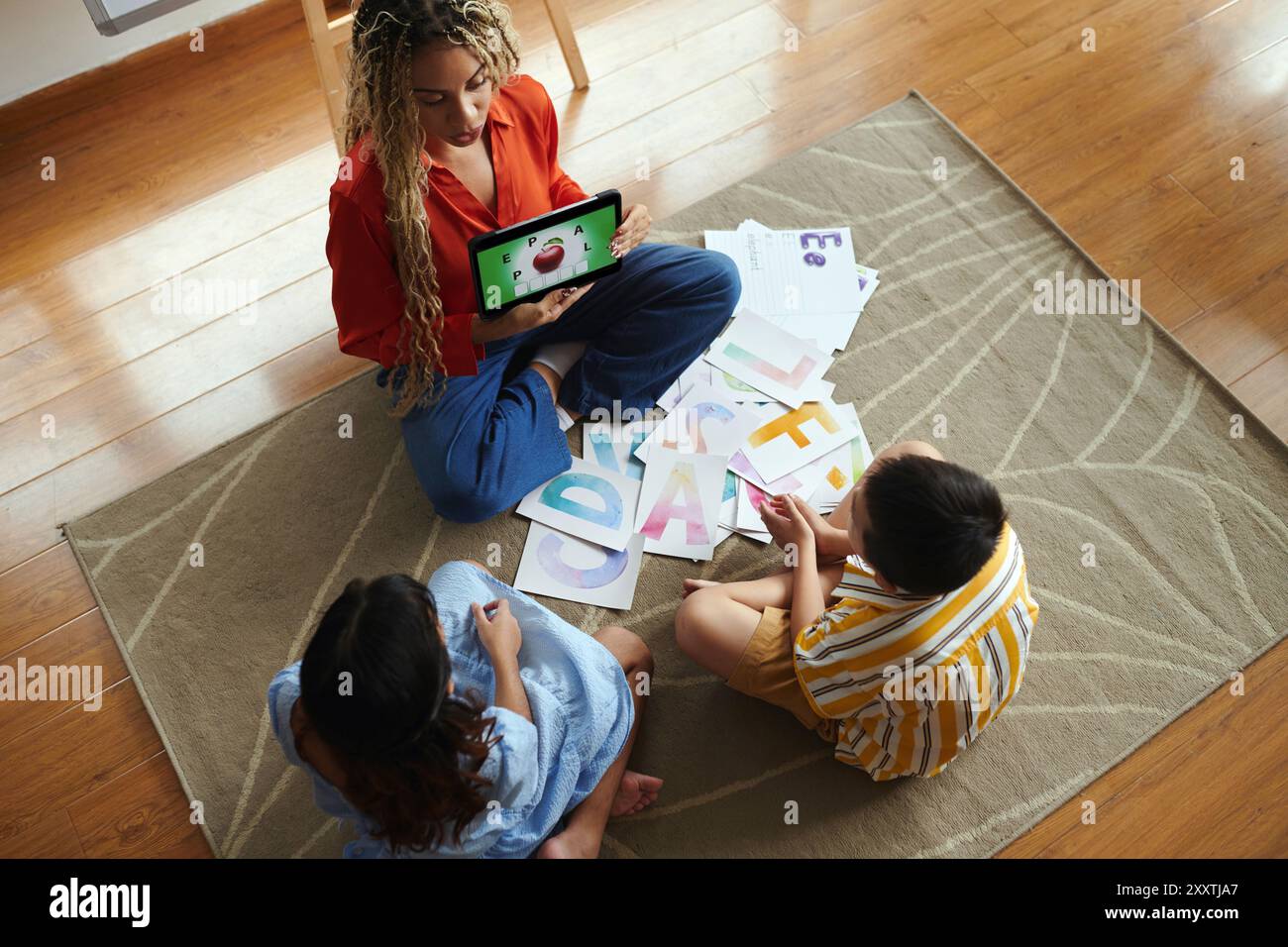 Engaging Children in Educational Digital Learning Activity Stock Photo ...