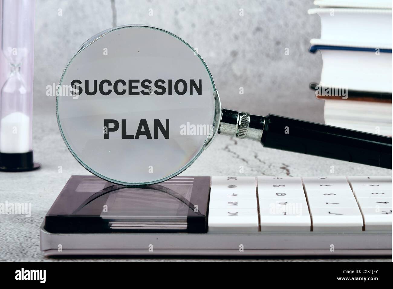 SUCCESSION PLAN word alphabet letters on the background through a ...